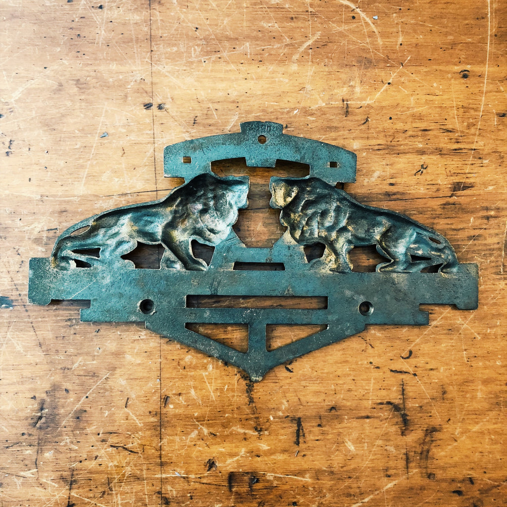 Antique Cast Iron Lion Decal Plaque with Dueling Beasts – Mad Van Antiques